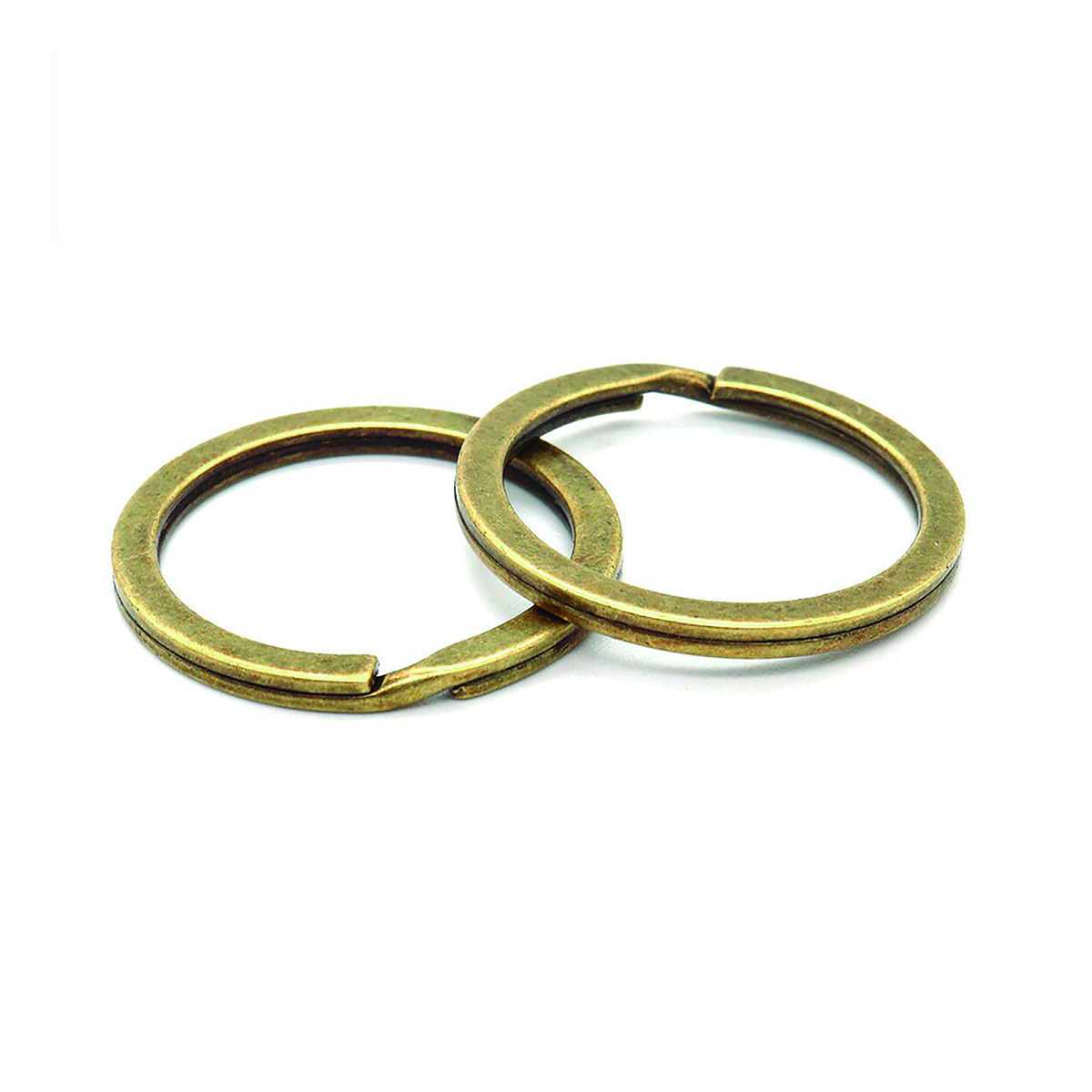 100 Aros chatos de metal para llaveros color bronce antiguo.